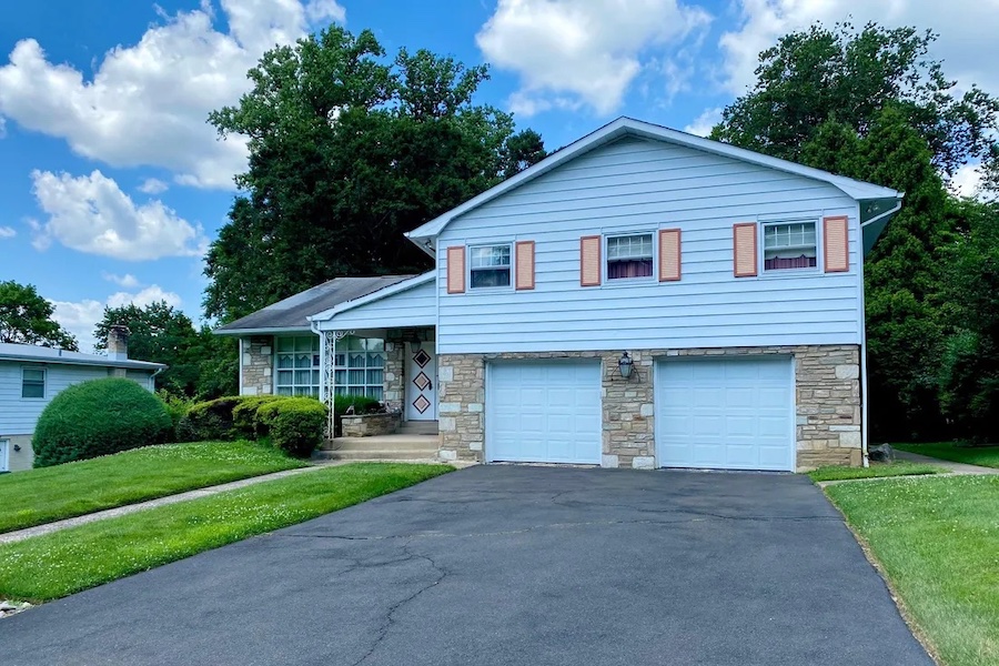 Blue Siding Homes Split Level A Stunning Cliffside Home | Alair Homes